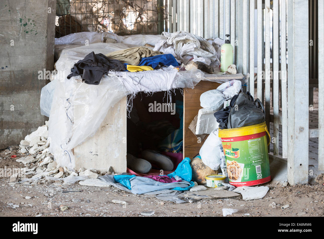 A homeless person sleeps in a makeshift shack, Cape Town, South Africa ...