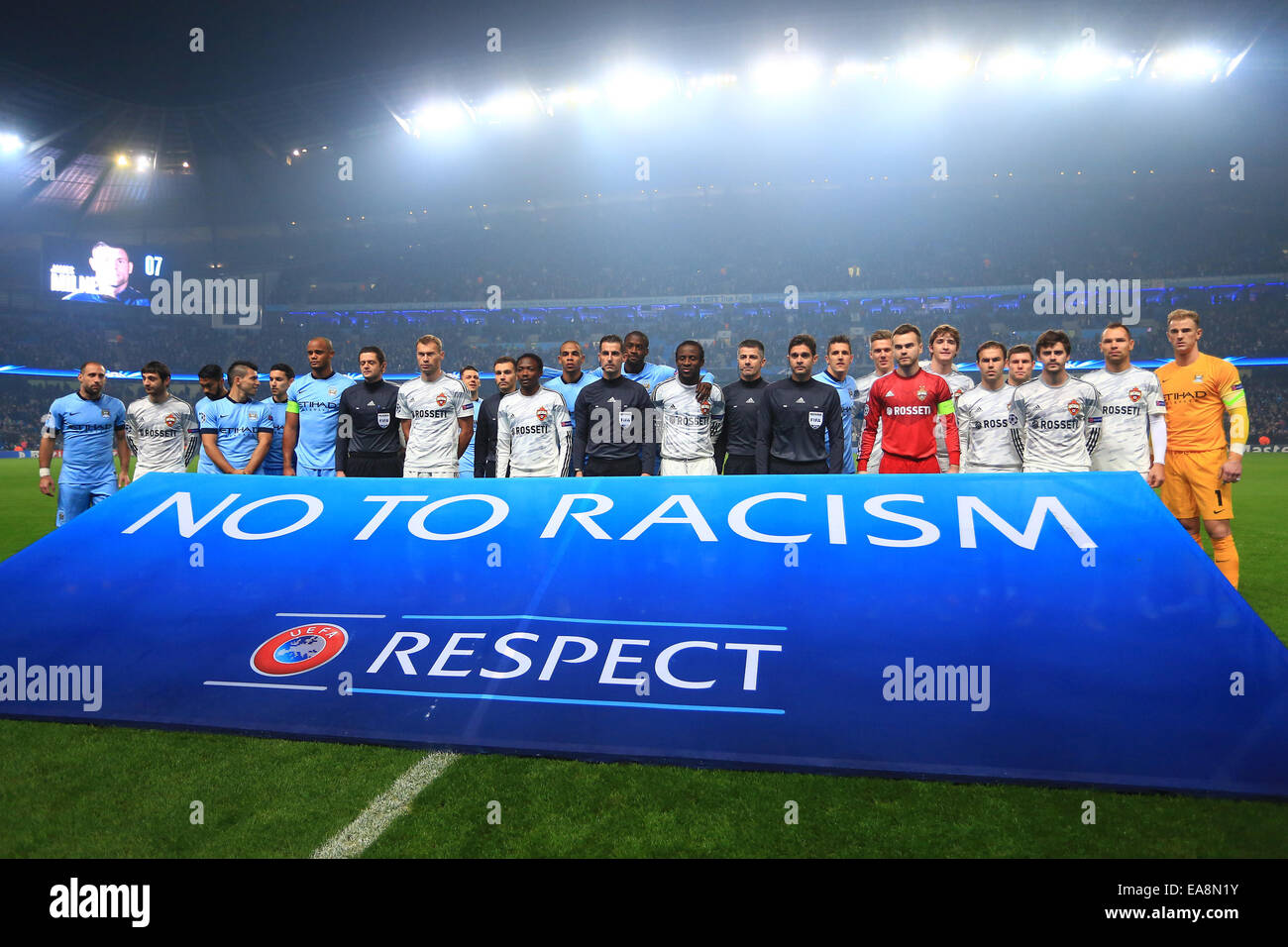 Manchester, UK. 5th Nov, 2014. The teams stand in front of an anti ...