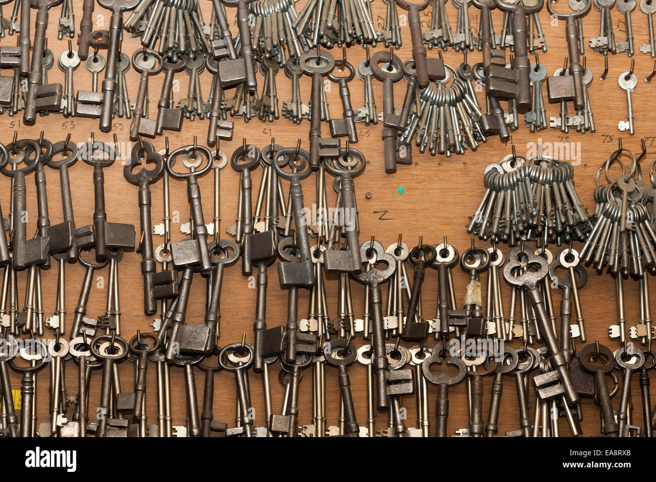 Blank keys hanging in a locksmith's shop Stock Photo - Alamy