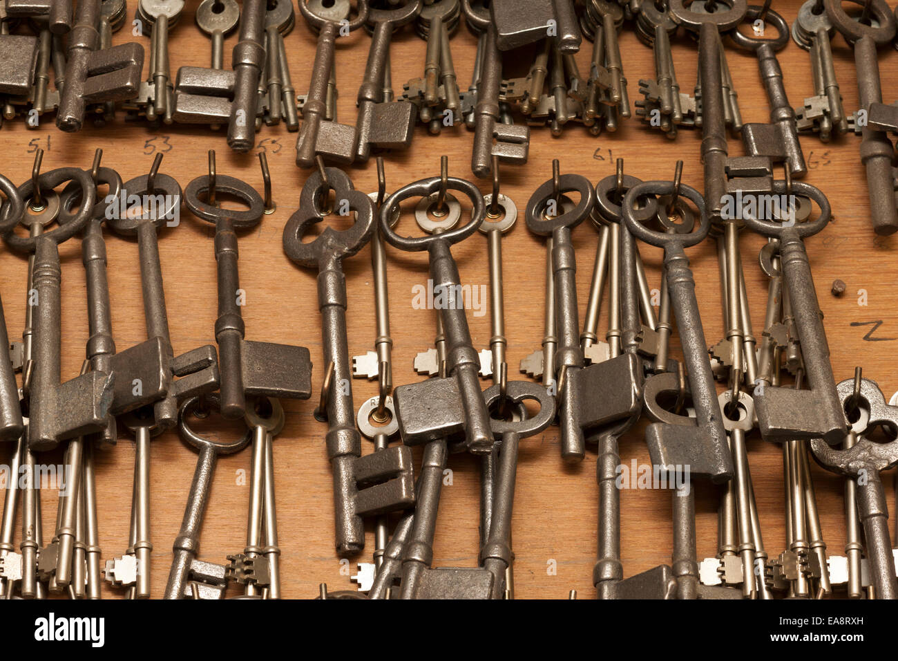 Blank keys hanging in a locksmith's shop Stock Photo - Alamy