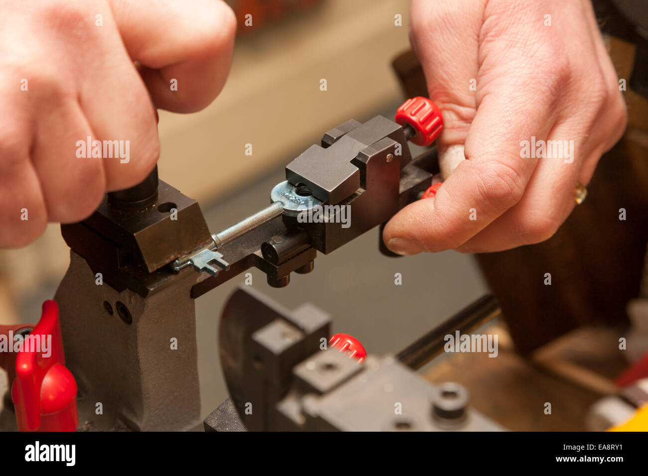 Cutting keys hi-res stock photography and images - Alamy