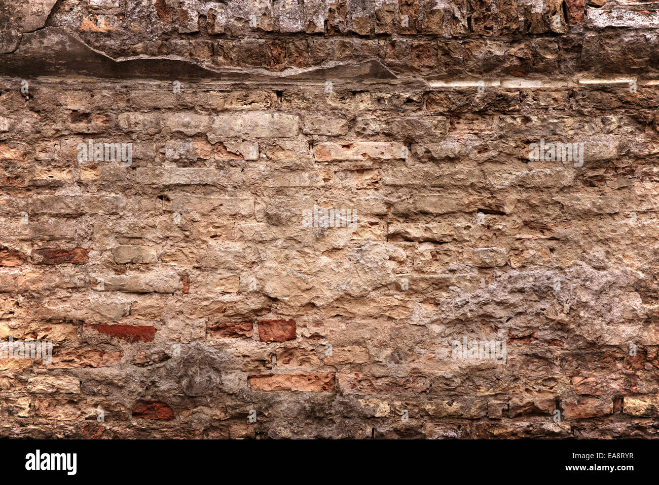 old brick wall with loose bricks and deteriorating mortar Stock Photo ...