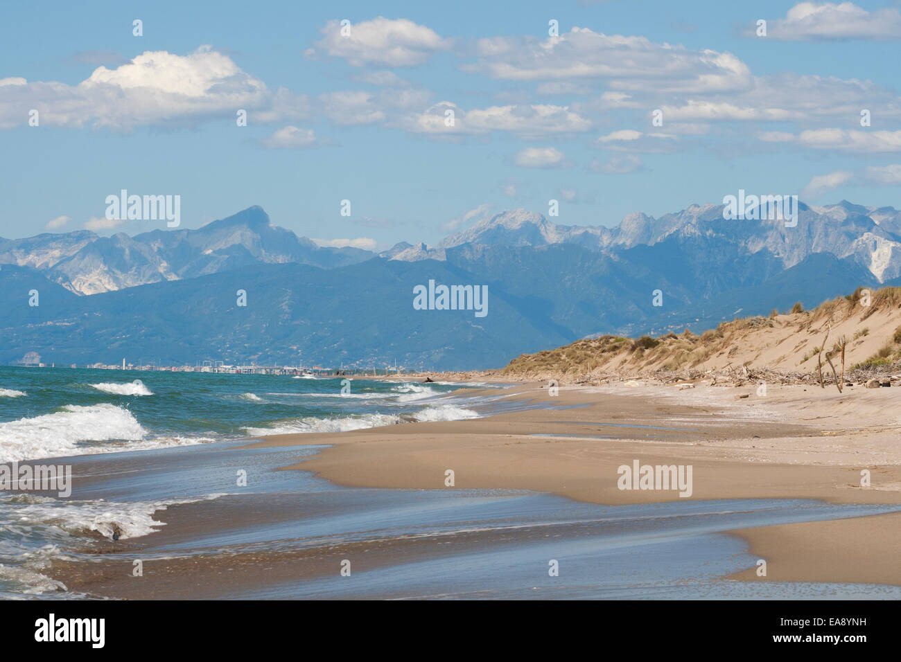 Tuscany deserted sand beach and mountains landscape, Italy Stock Photo ...