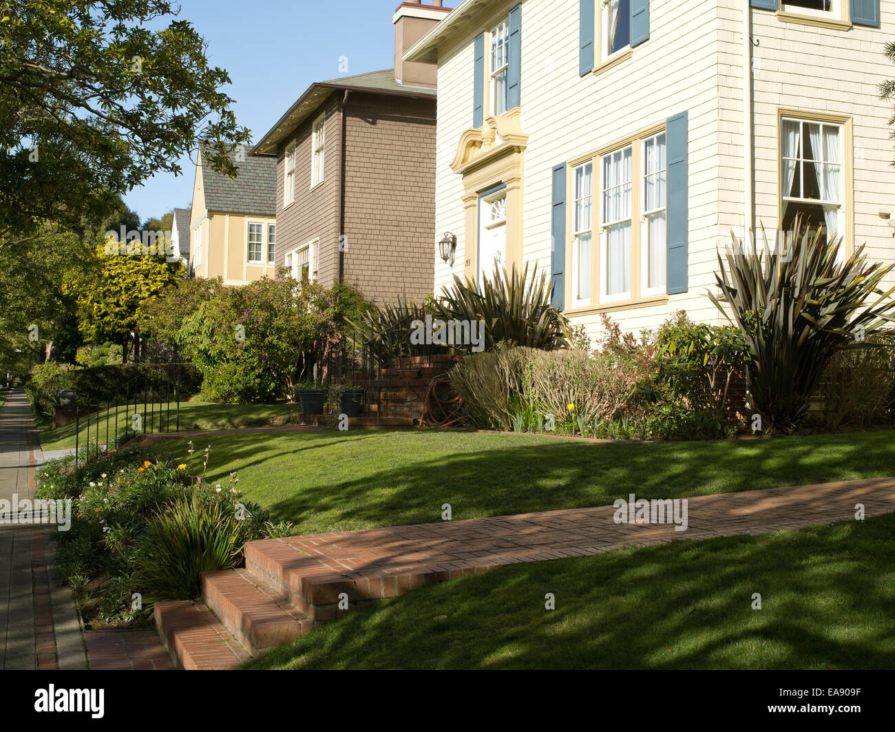 View of nice modern house in summer environment Stock Photo - Alamy