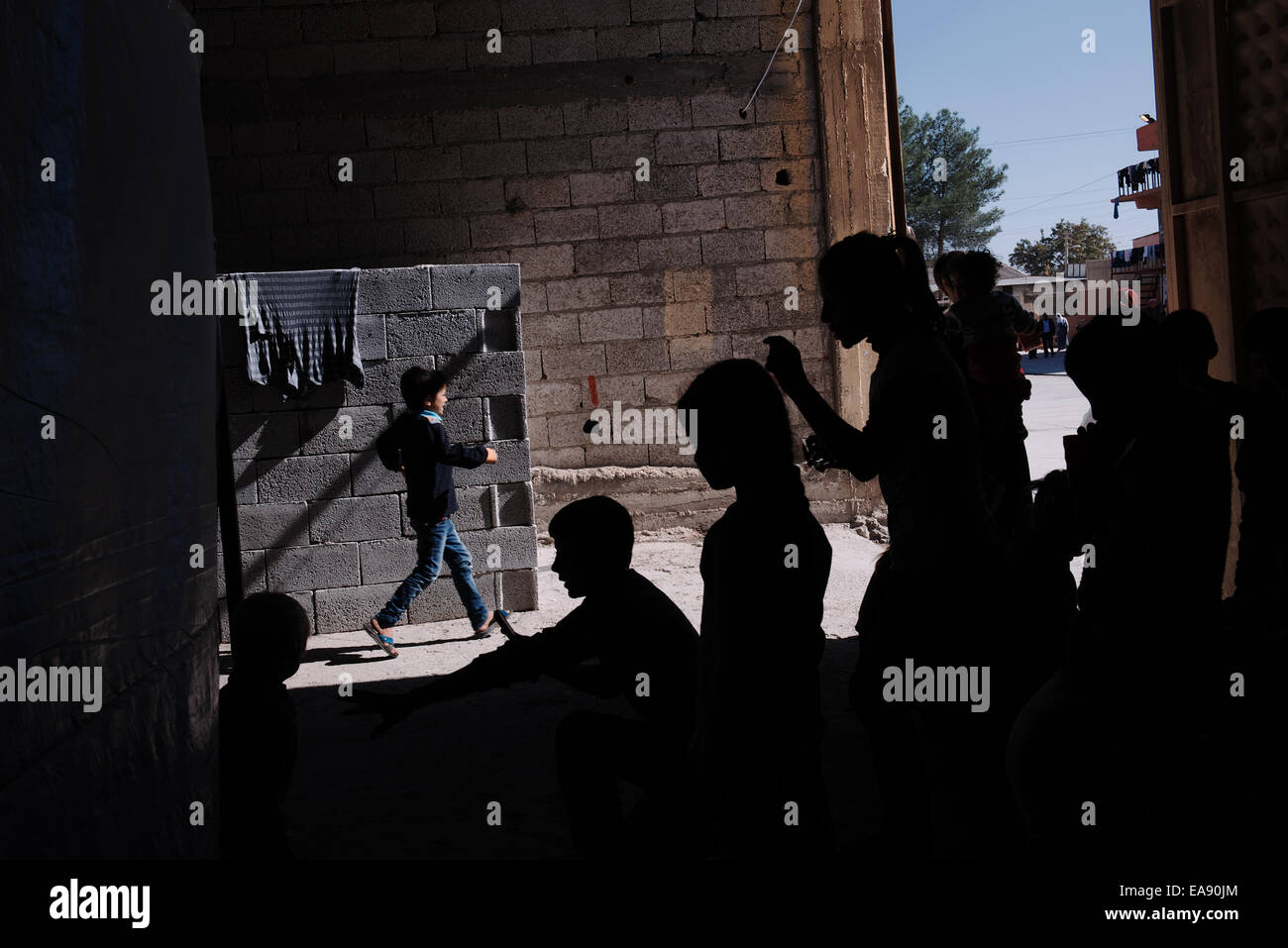Scene from a Kurdish refugee camp in the Turkish town of Suruc near the ...