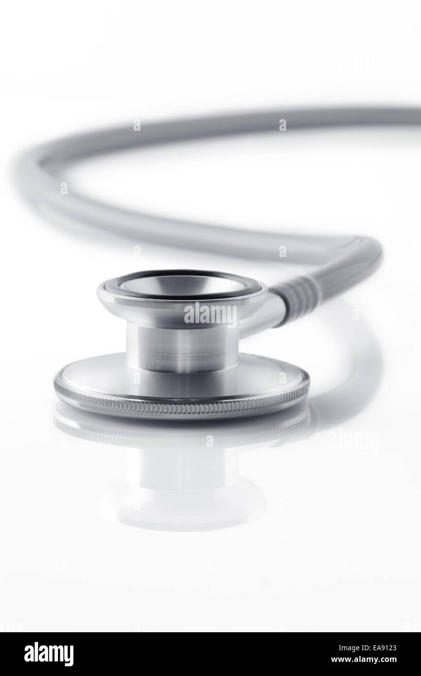 Close up view of grey stethoscope on white back Stock Photo - Alamy
