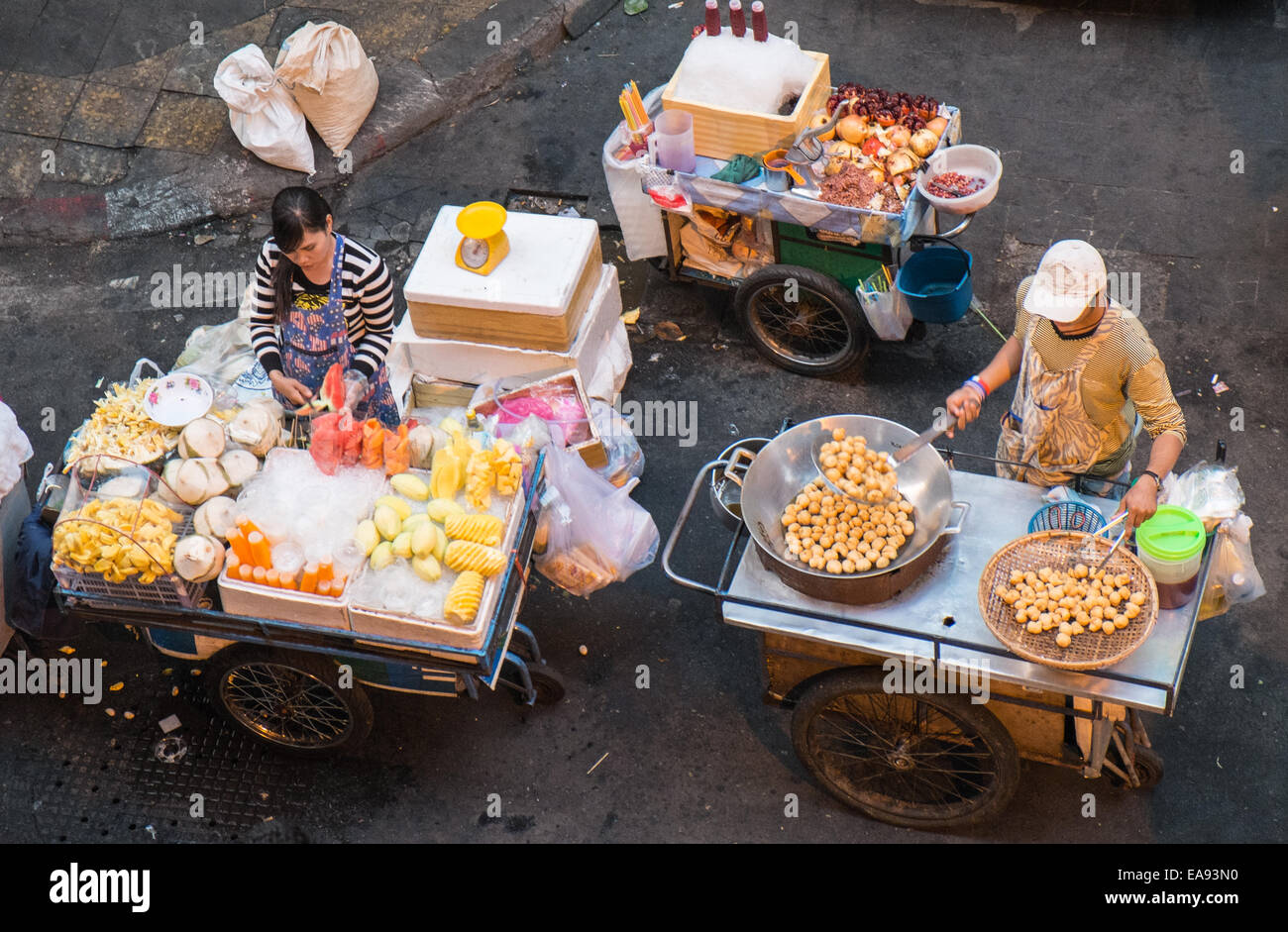 Street food stall, shop, carts, frying food, and chopped, fresh ...