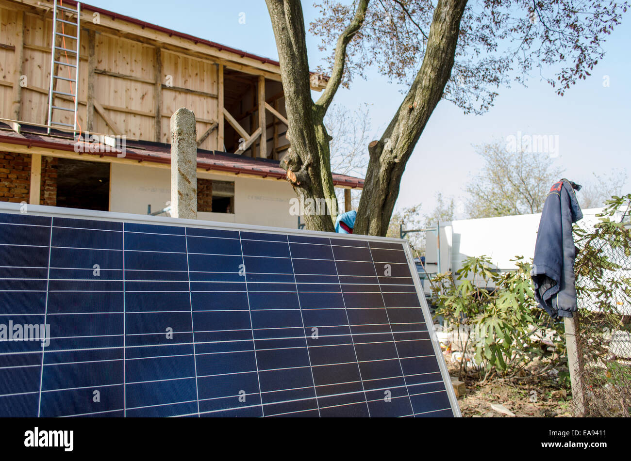 Solar photovoltaic panels mounted on a tiled house roof Stock Photo - Alamy