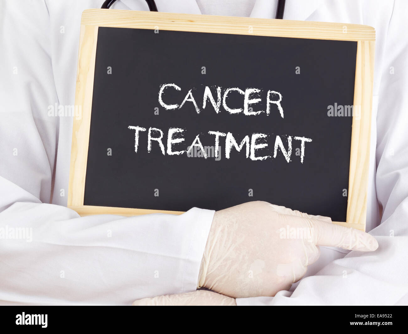 Doctor shows information: cancer treatment Stock Photo - Alamy