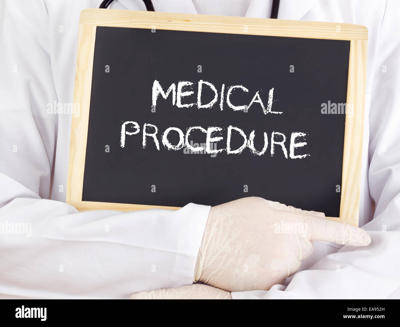 Doctor shows information: medical procedure Stock Photo - Alamy