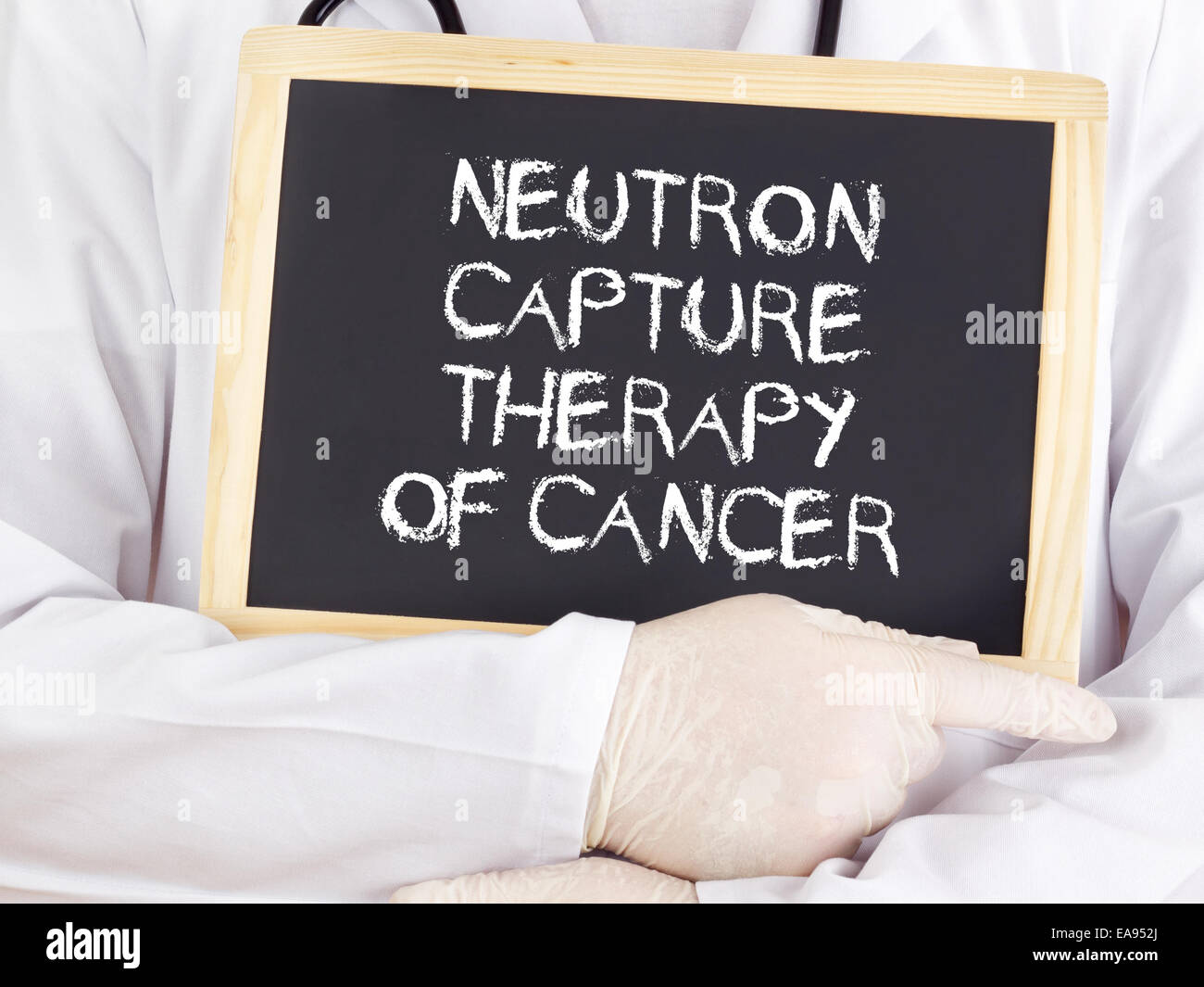 Doctor shows information: neutron capture therapy of cancer Stock Photo ...