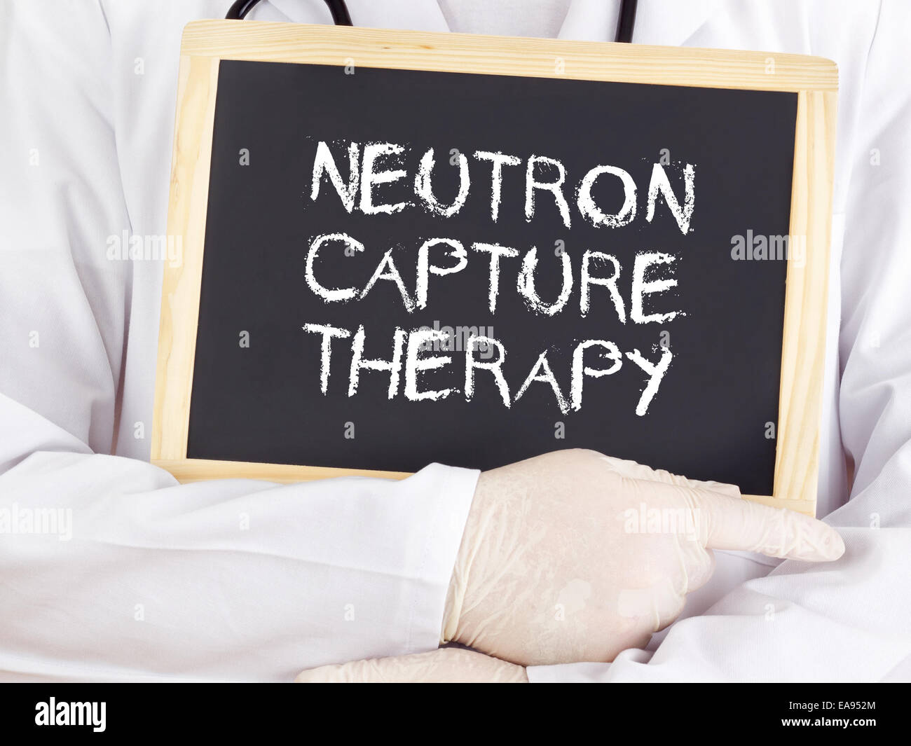 Doctor shows information: neutron capture therapy Stock Photo - Alamy