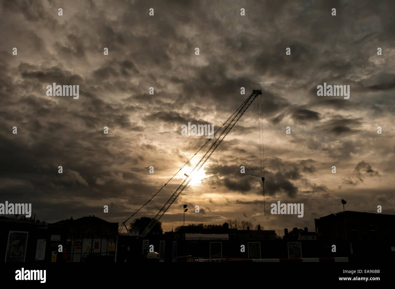 construction crane at sunset Stock Photo - Alamy