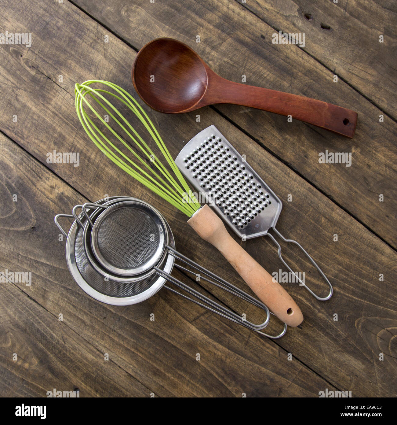 Kitchen Utensils on wooden table, from above Stock Photo - Alamy