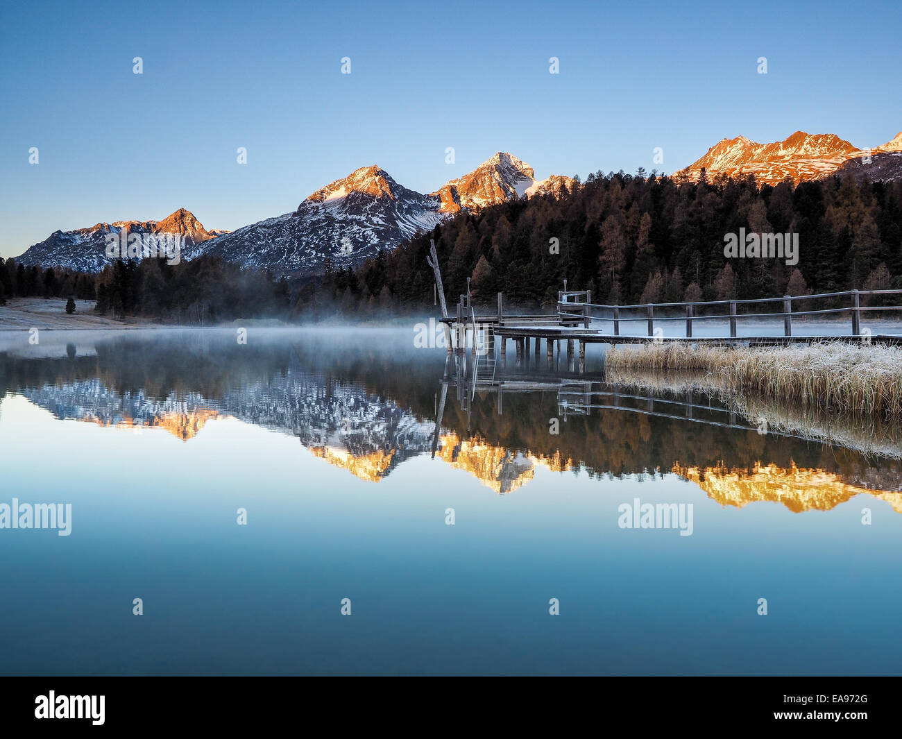 Autumn reflections on the lake Lej da Staz, Engadine Saint Moritz ...