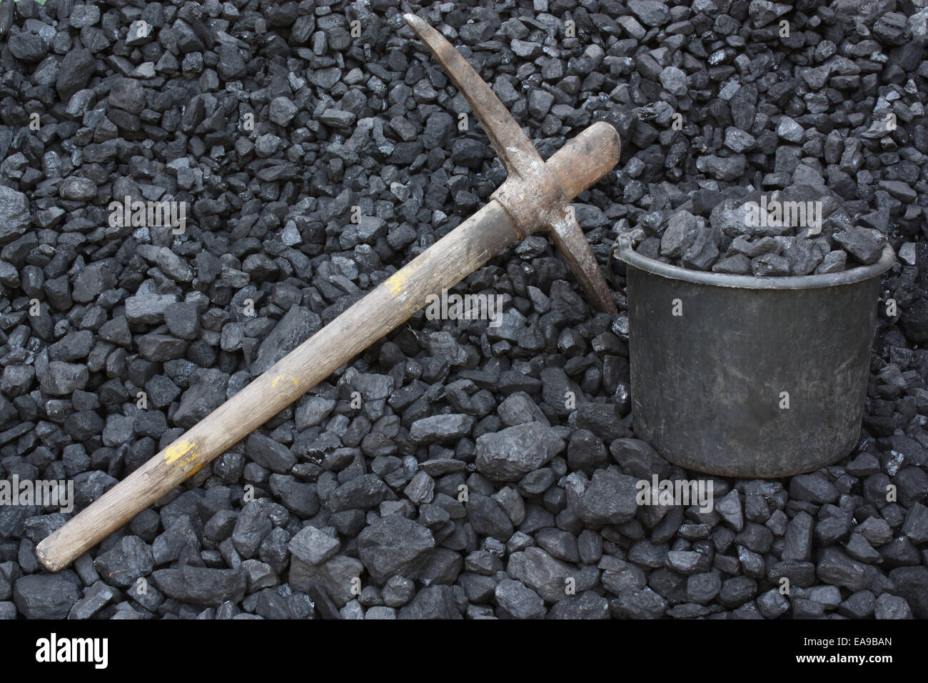 Pickaxe and bucket coal Stock Photo - Alamy
