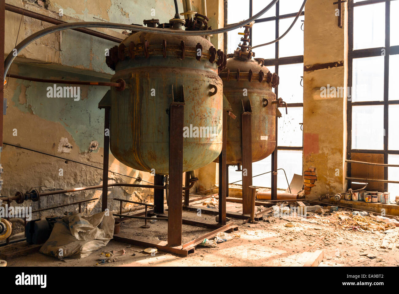 Industrial interior with storage tank Stock Photo - Alamy
