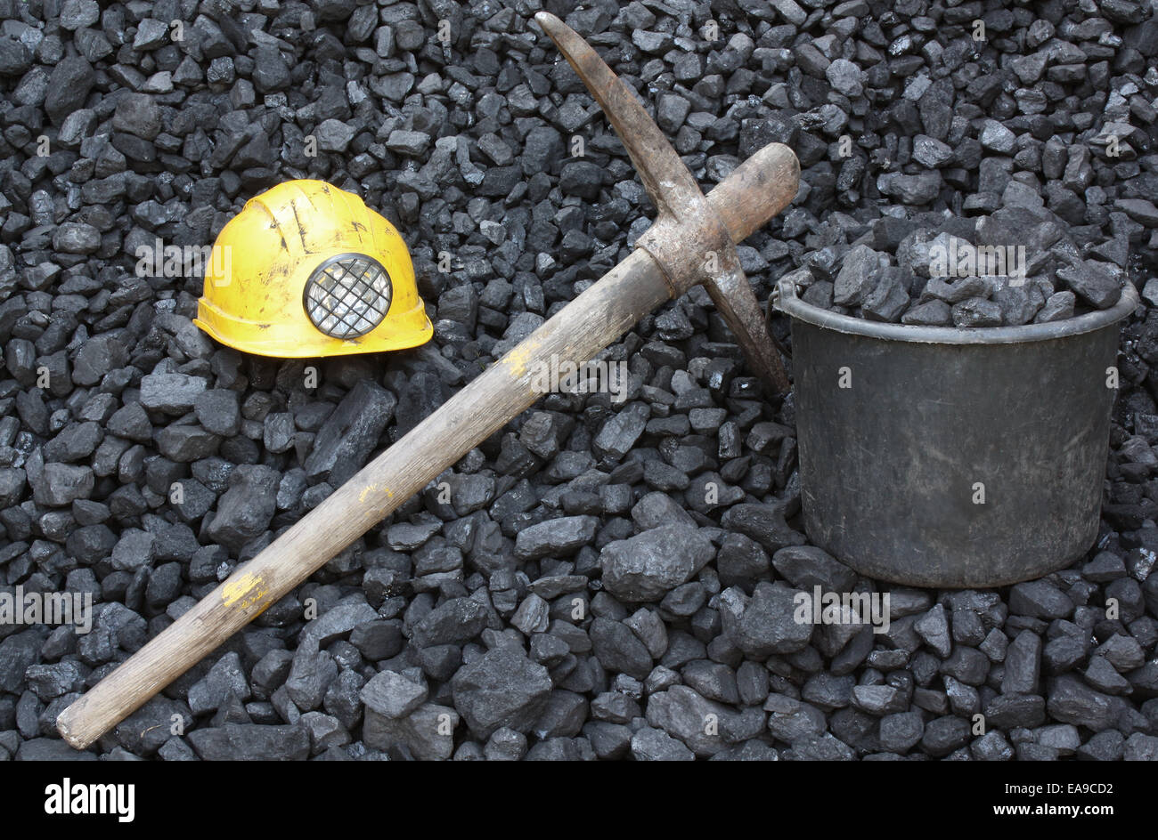 Mining tools on a background of coal Stock Photo - Alamy