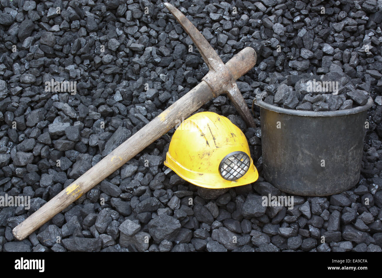 Mining tools on a background of coal Stock Photo - Alamy