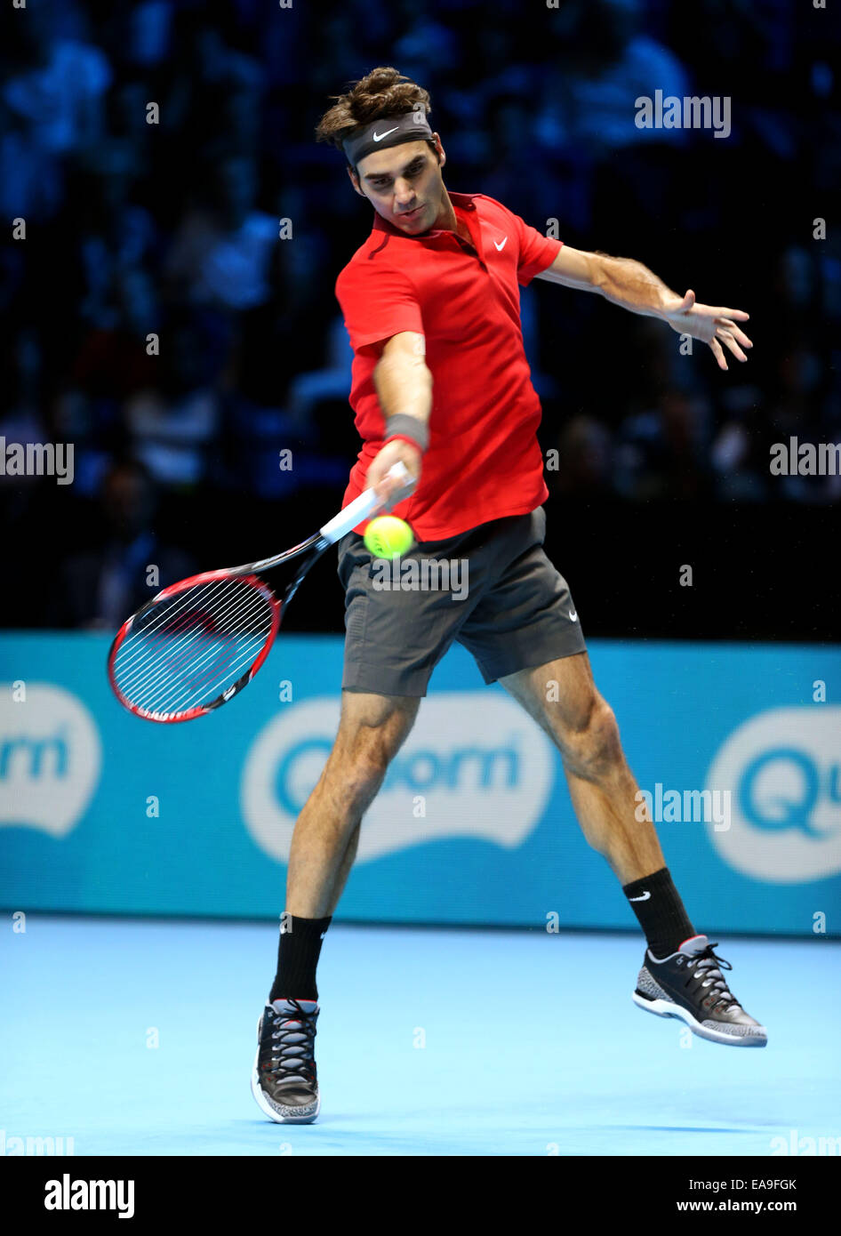London, Britain. 9th Nov, 2014. Roger Federer of Switzerland hits a ...