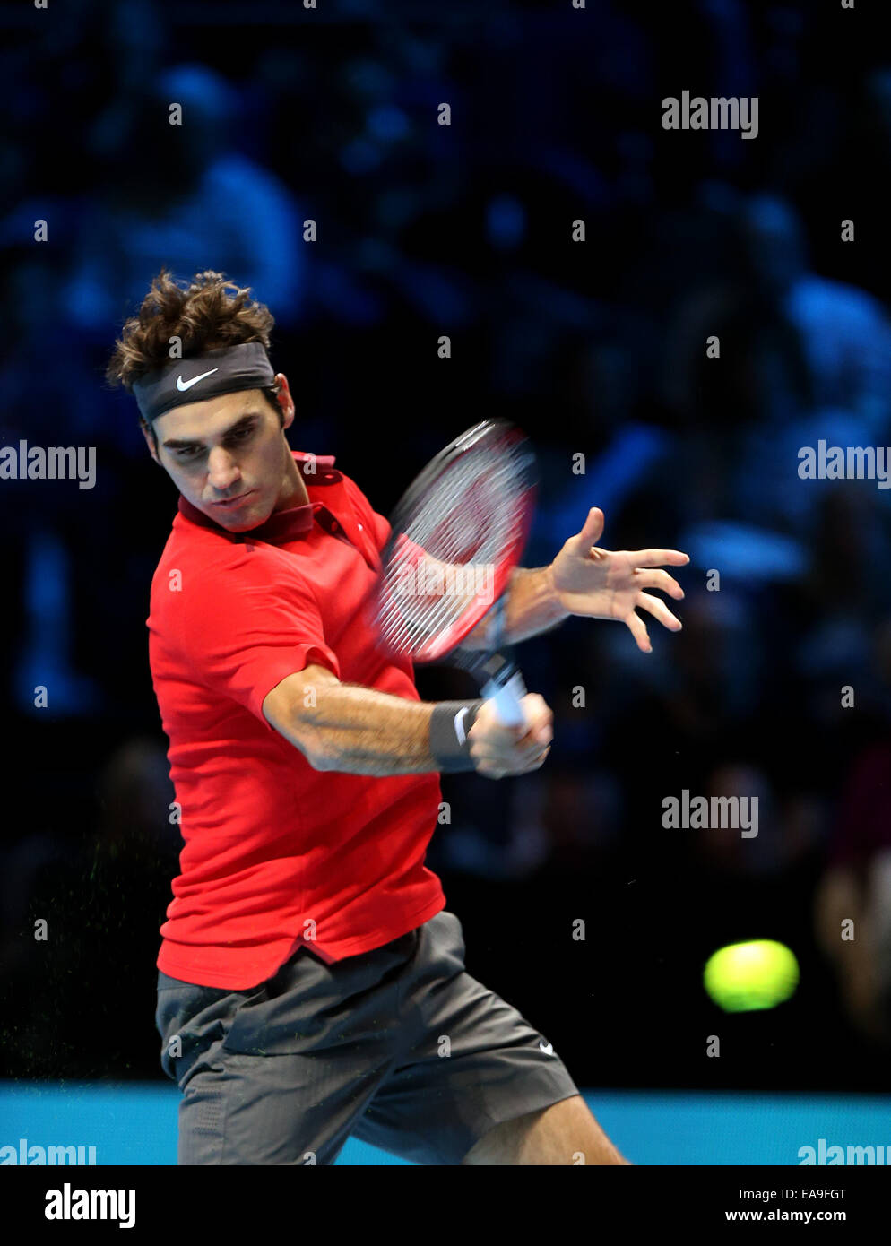 London, Britain. 9th Nov, 2014. Roger Federer of Switzerland hits a ...