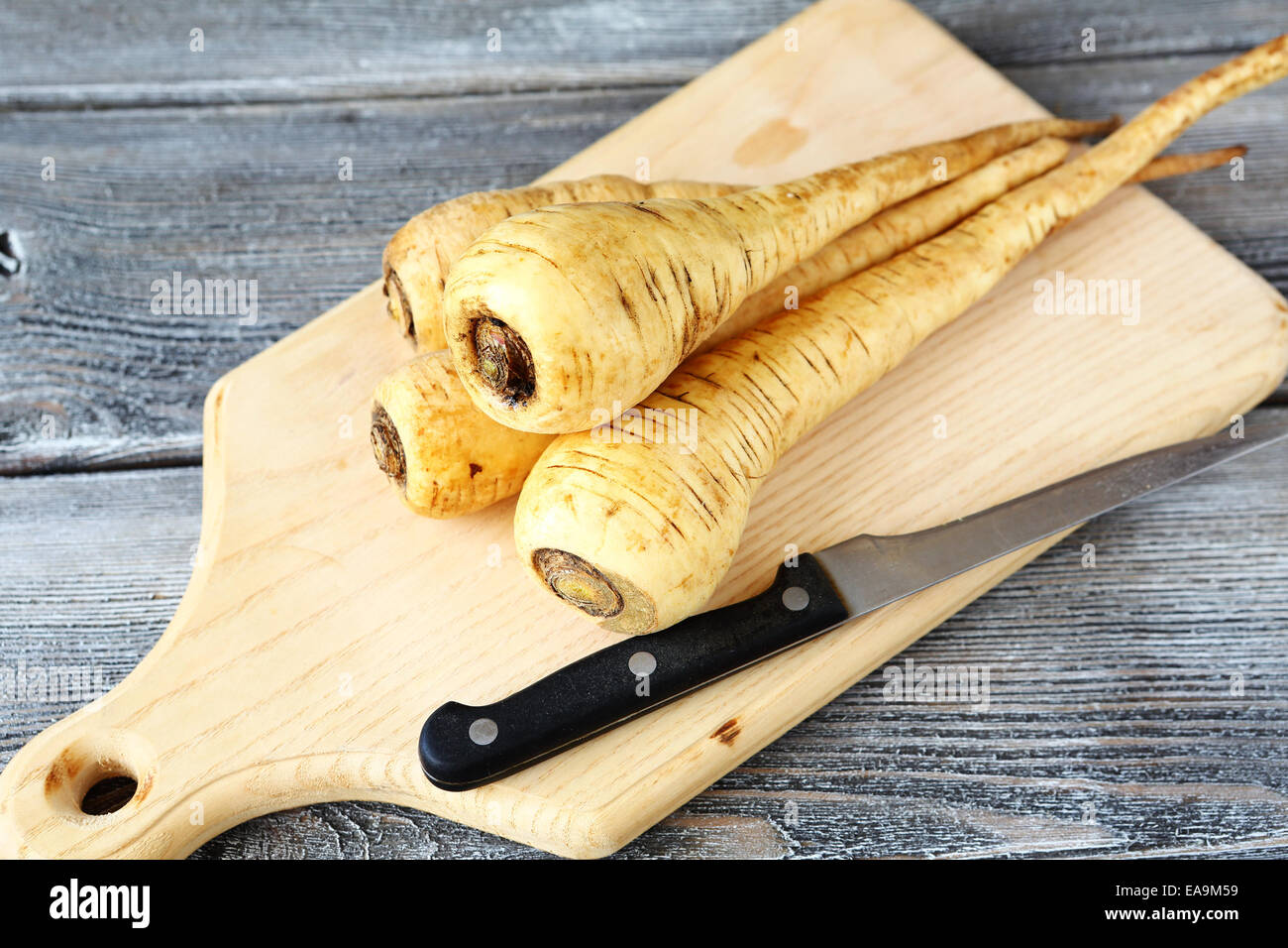 Fresh parsnips on cutting hi-res stock photography and images - Alamy