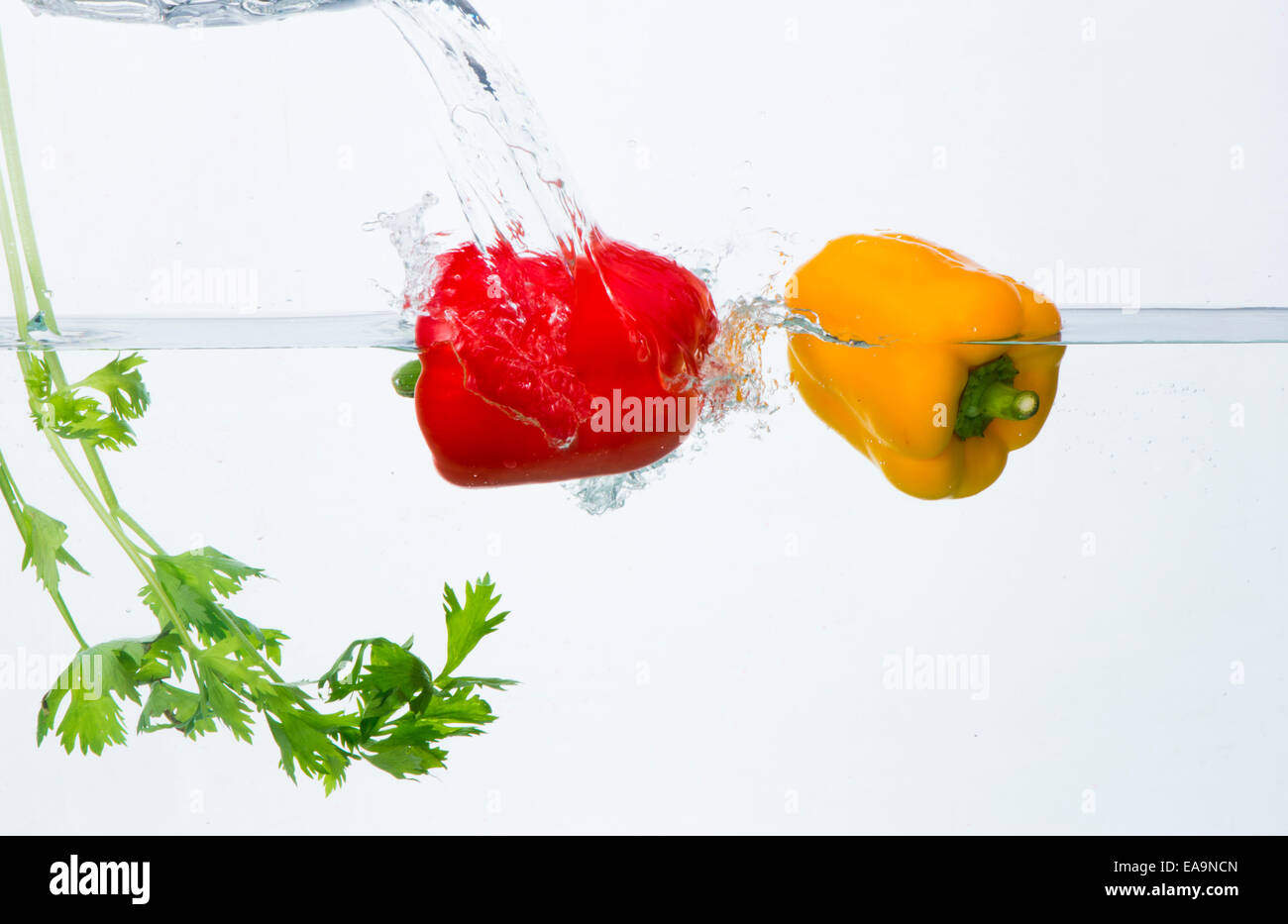 Bell pepper in water Stock Photo - Alamy