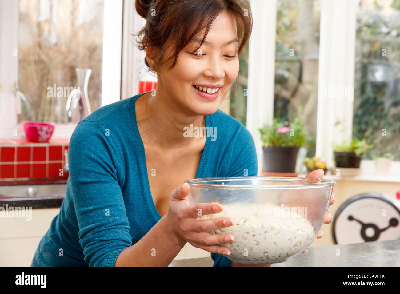 Woman making bread hi-res stock photography and images - Alamy
