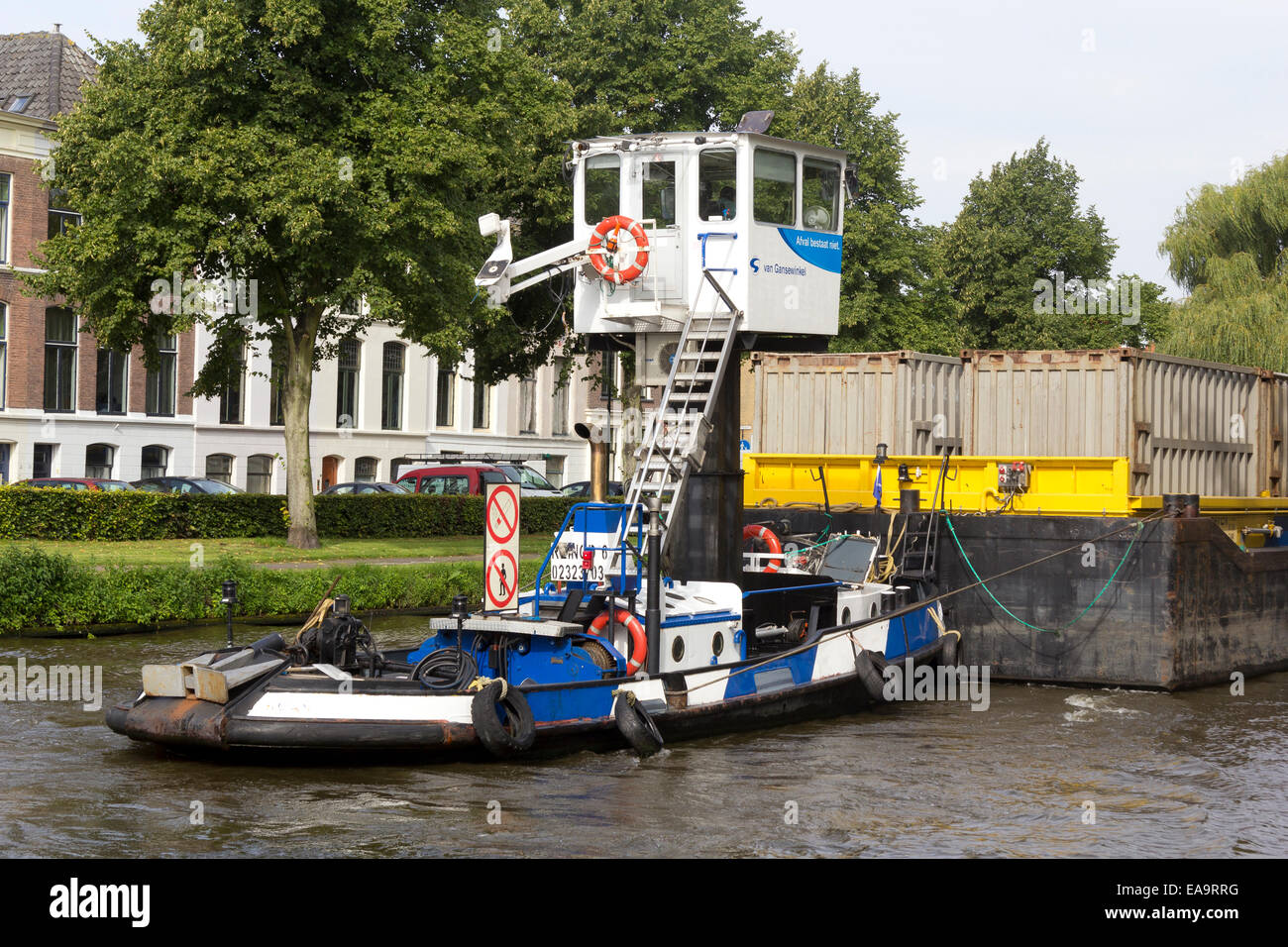 Transport of containers on the Rijn-Schie Canal in The Netherlands ...