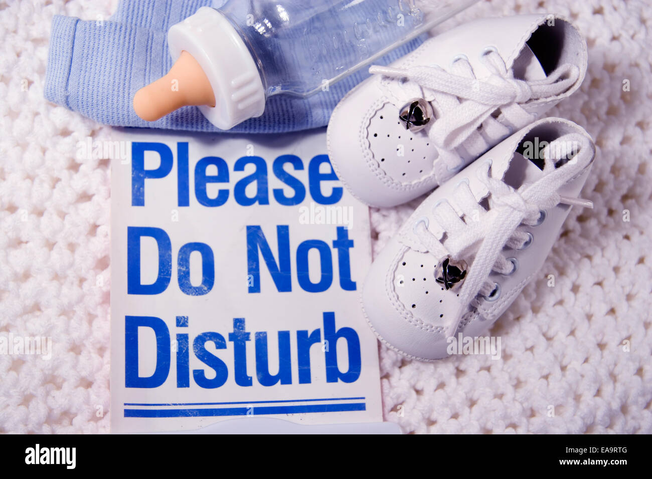 Baby stuff with a please do not disturb sign Stock Photo - Alamy