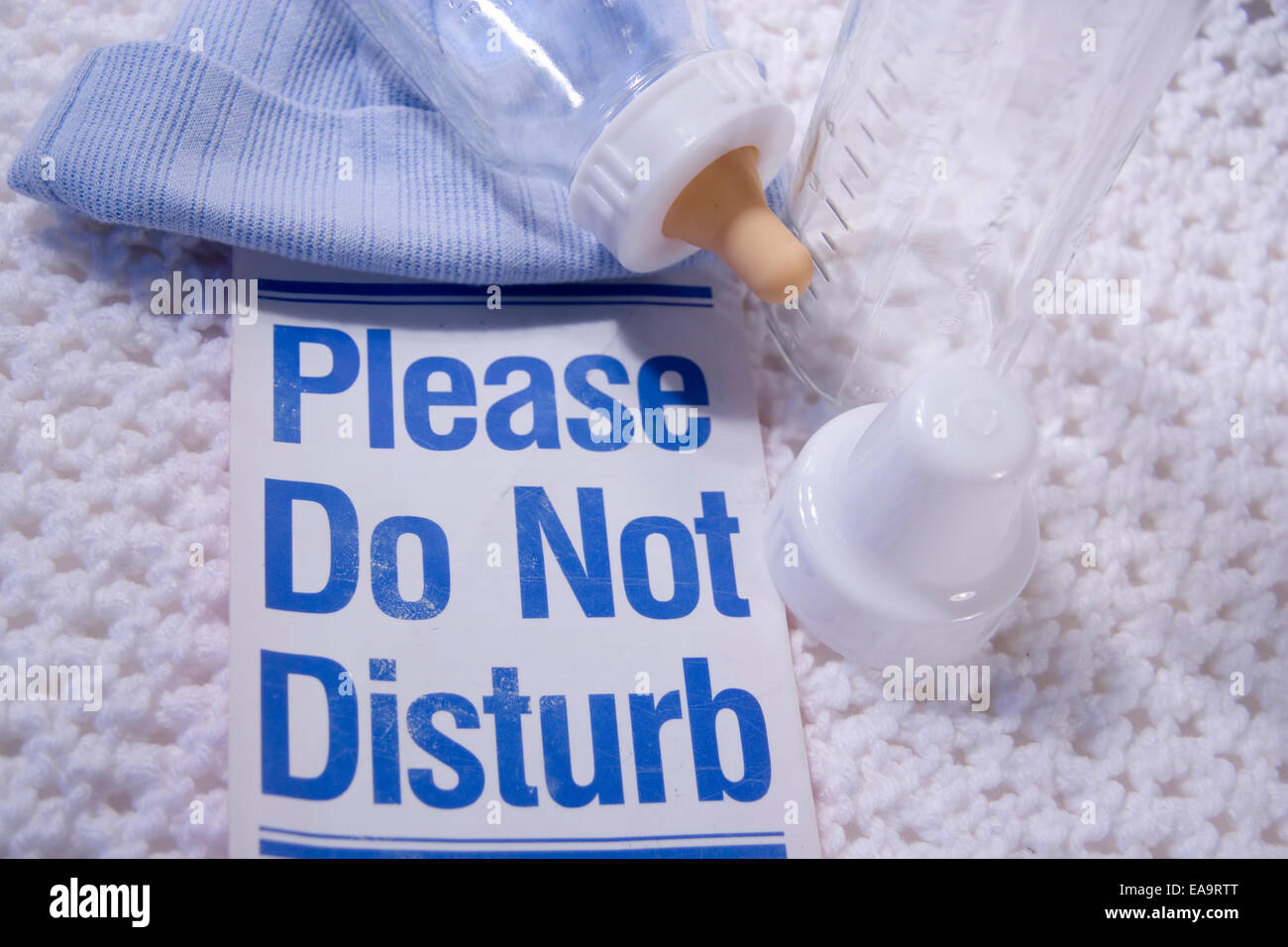 Baby stuff with a please do not disturb sign Stock Photo - Alamy