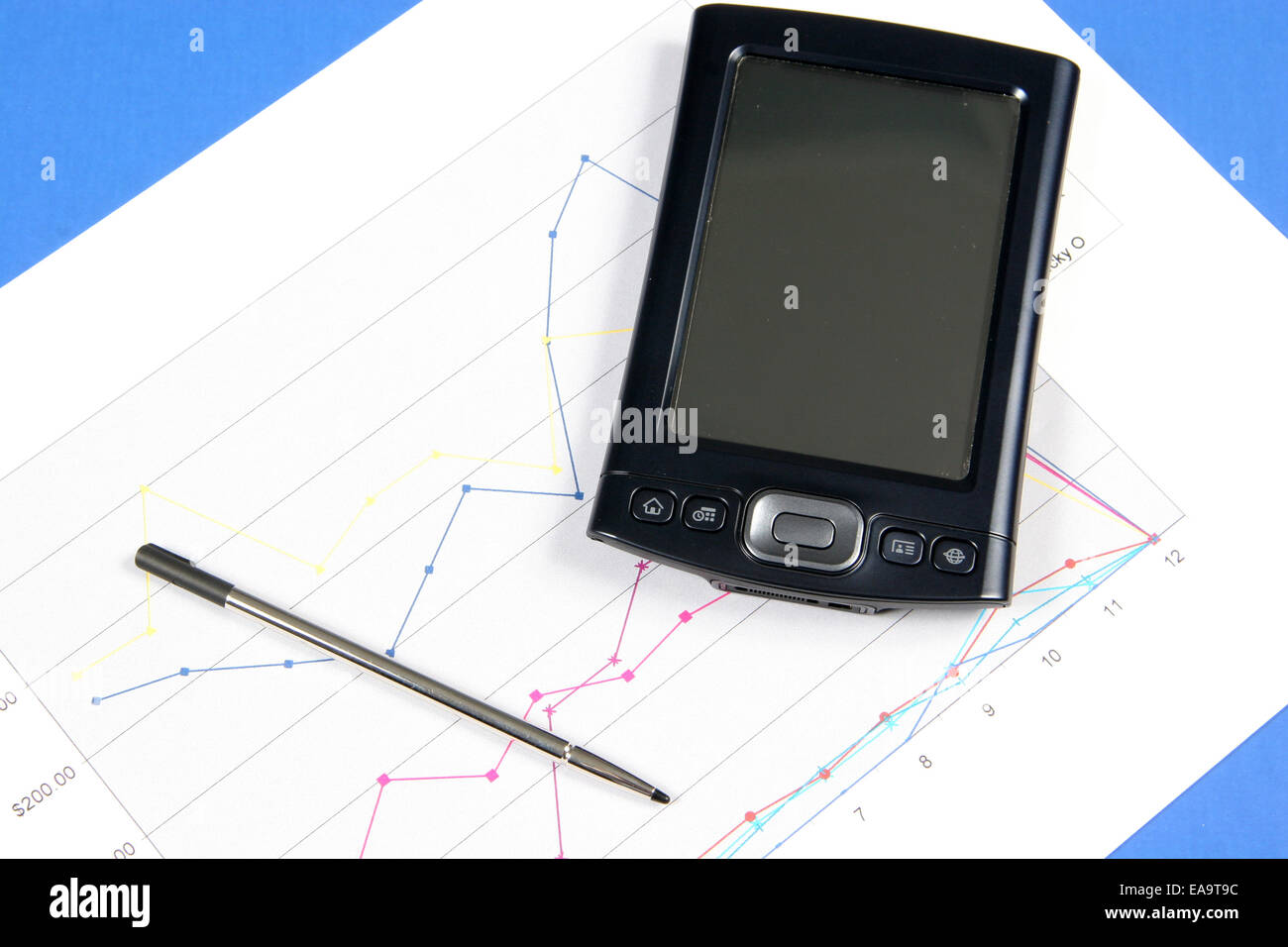 PDA and Chart on blue background Stock Photo - Alamy