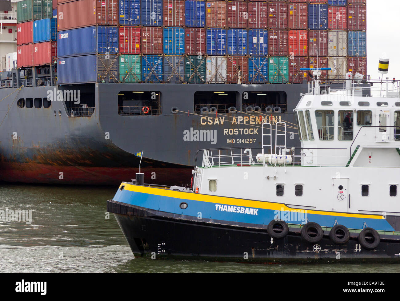 Stacks of shipping containers piled up on a container ship in the Port ...