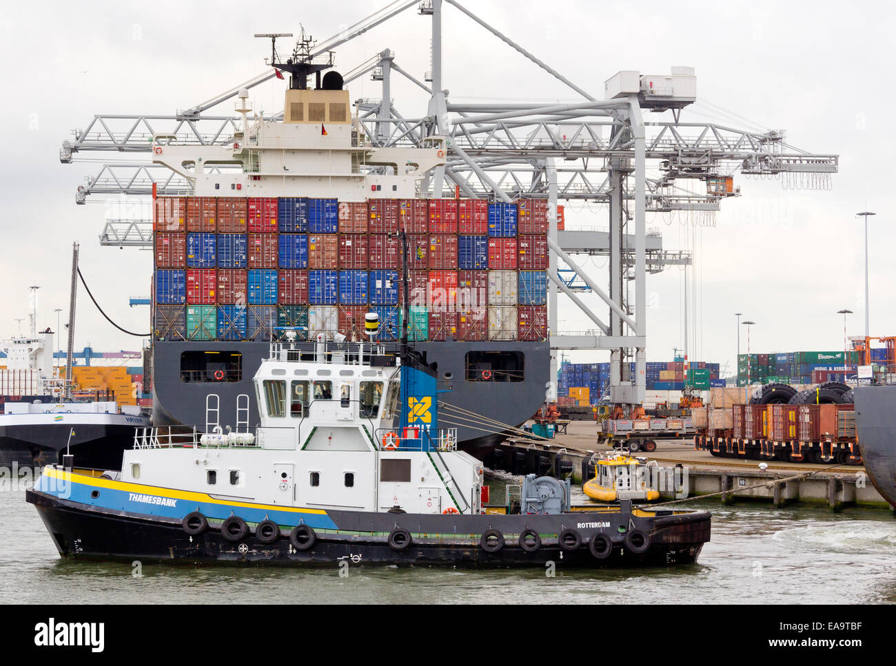 Stacks of shipping containers piled up on a container ship in the Port ...
