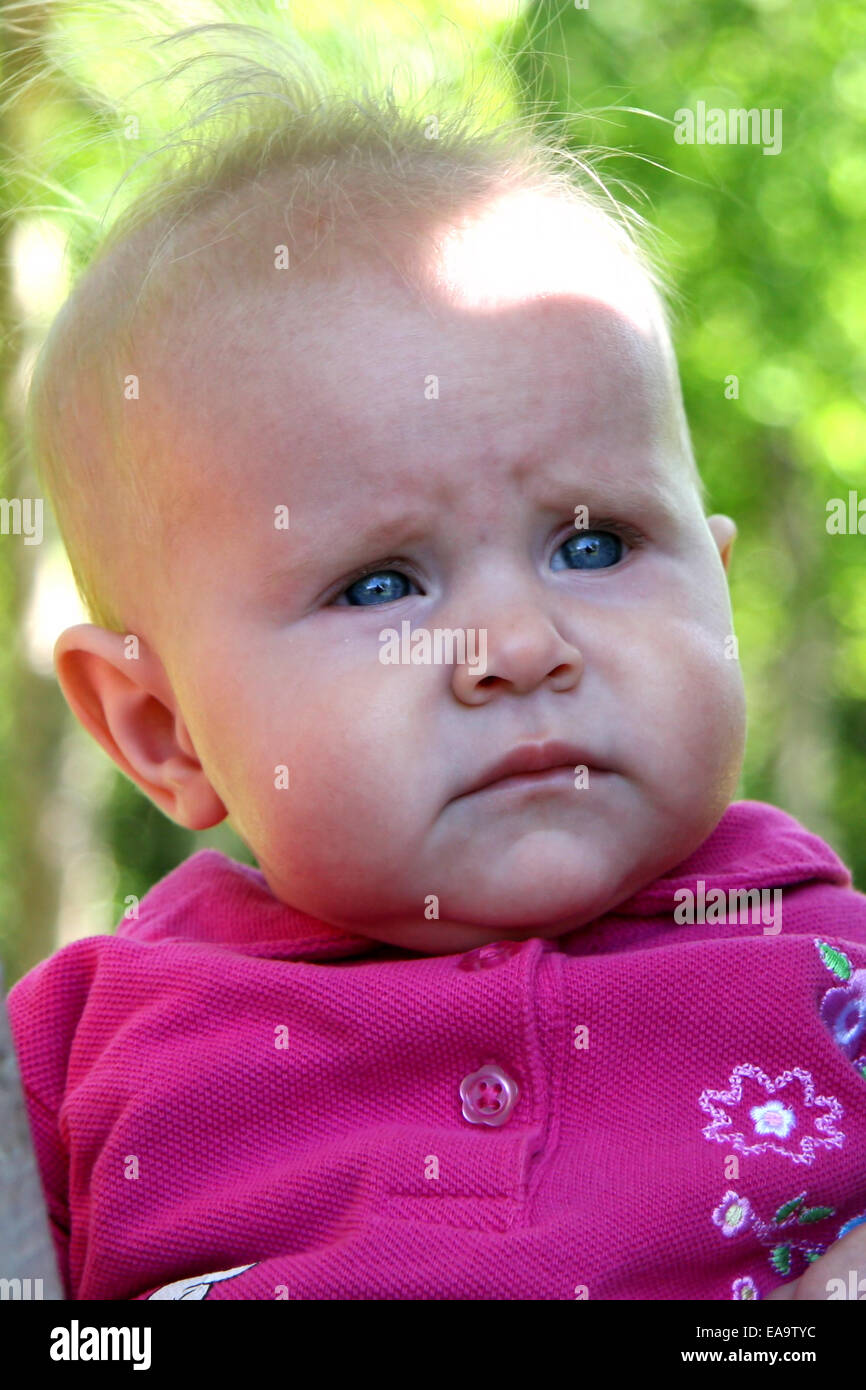 Little Baby Girl closeup on trees in summer Stock Photo - Alamy