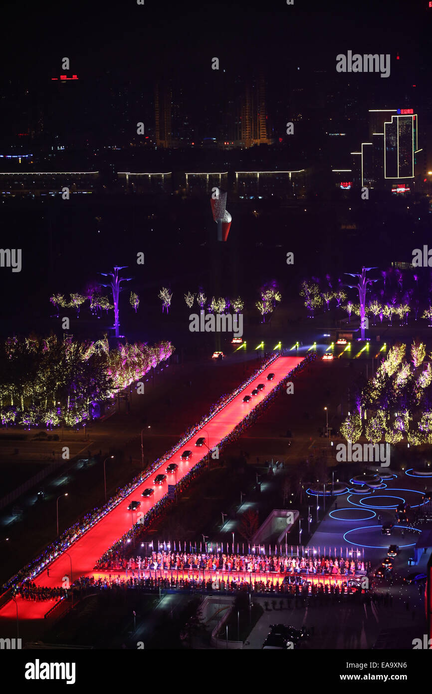 Beijing, China. 10th Nov, 2014. A motorcade arrives at the National ...