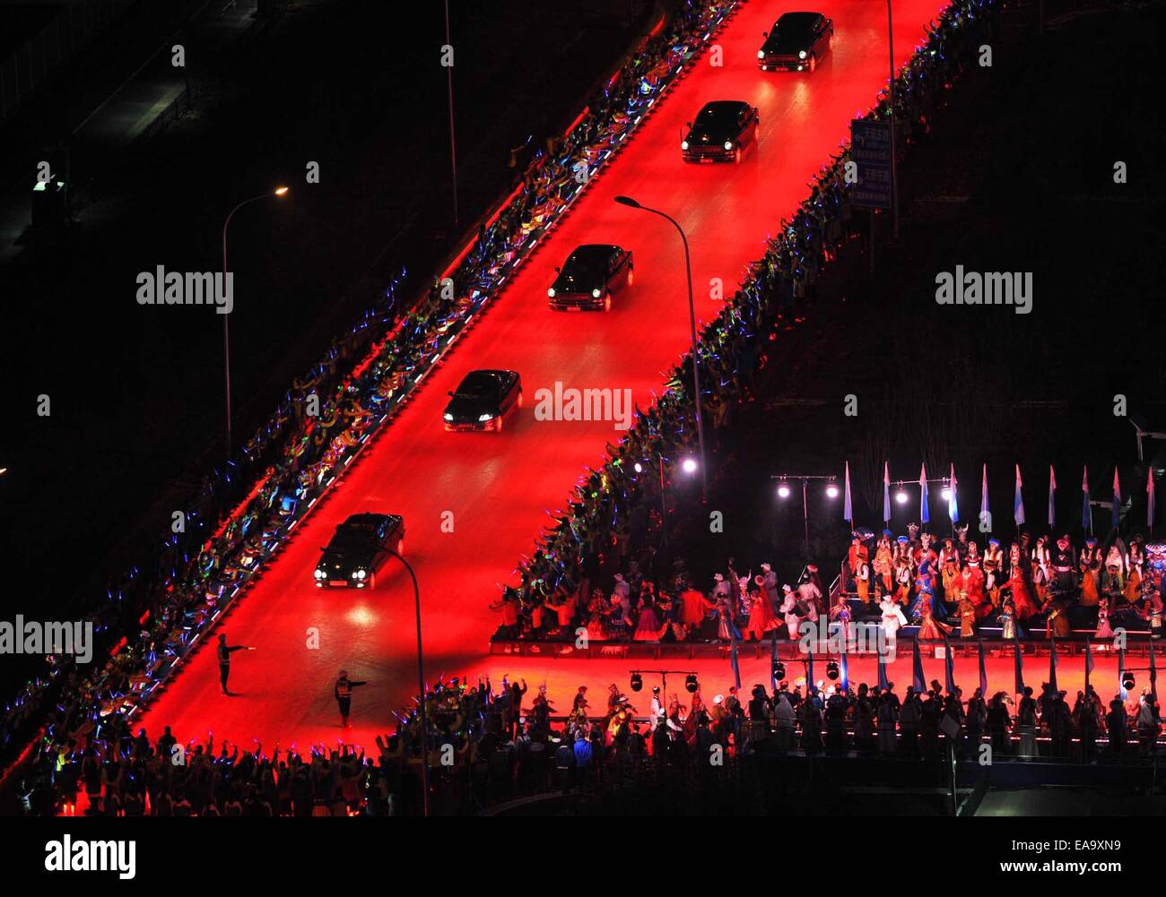 Beijing, China. 10th Nov, 2014. A motorcade arrives at the National ...