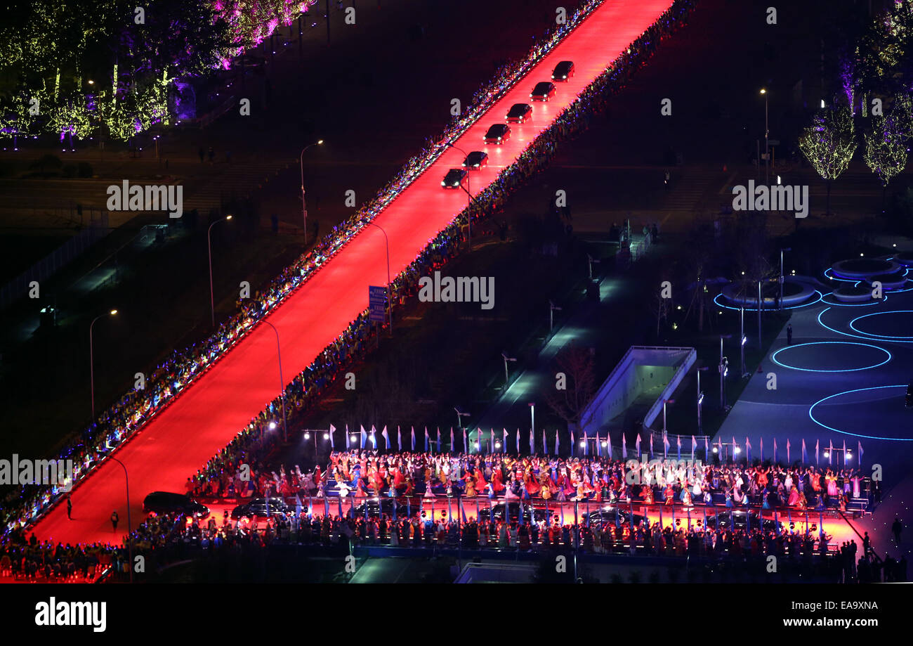 Beijing, China. 10th Nov, 2014. A motorcade arrives at the National ...