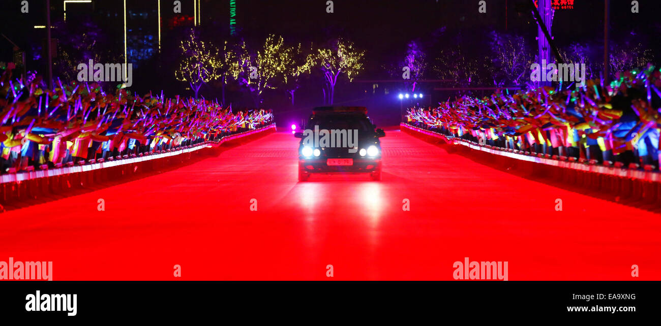 Beijing, China. 10th Nov, 2014. A motorcade arrives at the National ...