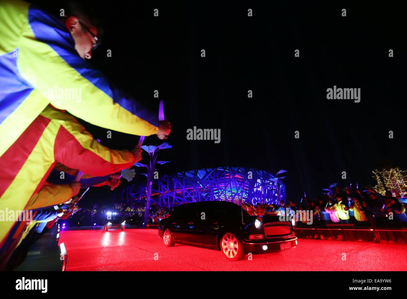 Beijing, China. 10th Nov, 2014. A motorcade arrives at the National ...