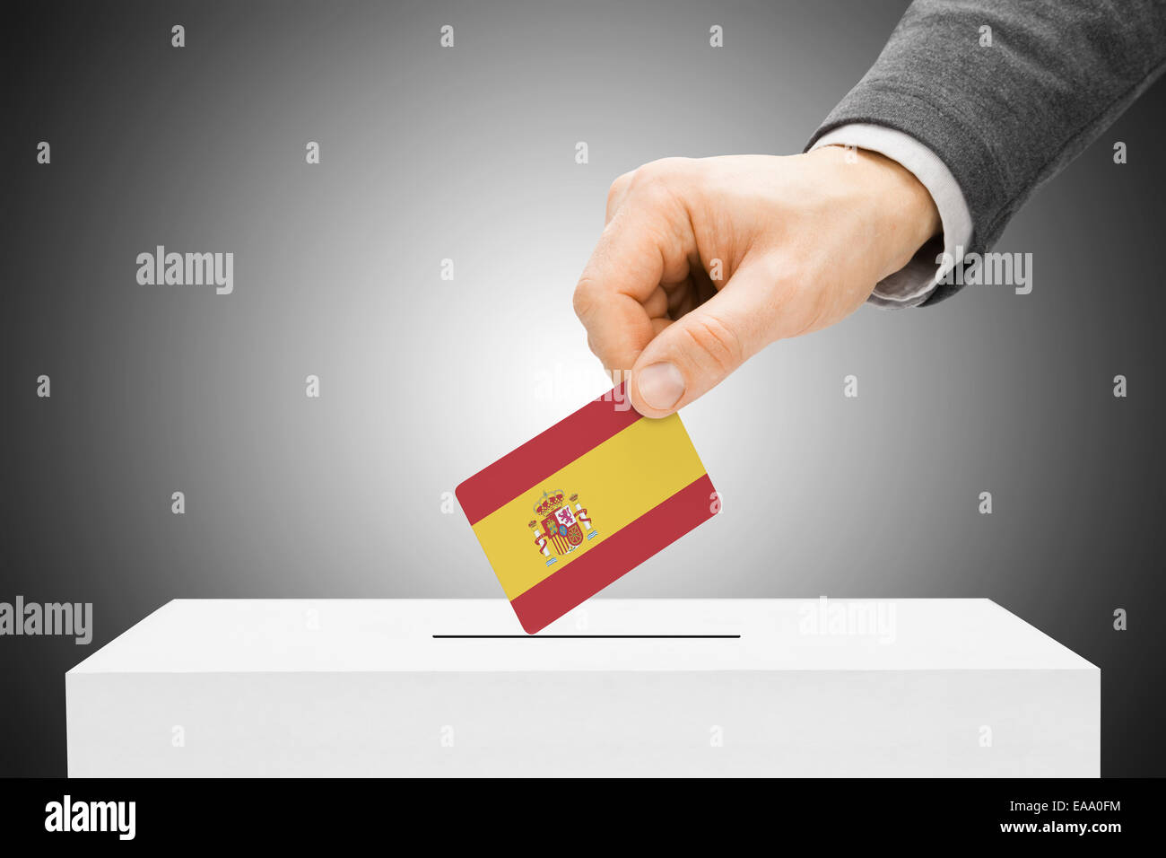 Voting concept - Male inserting flag into ballot box - Spain Stock ...