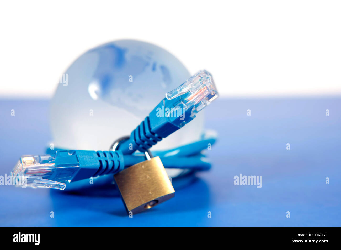 Network cable with lock around a earth with blue background Stock Photo ...