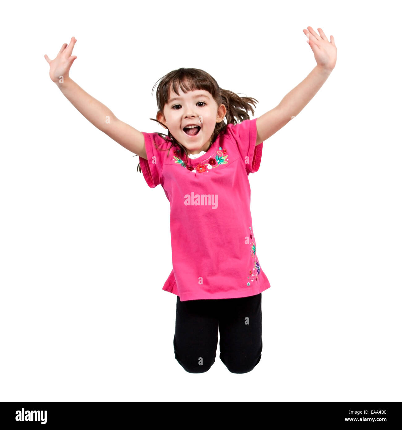 Adorable and happy little girl jumping in air. isolated on white ...