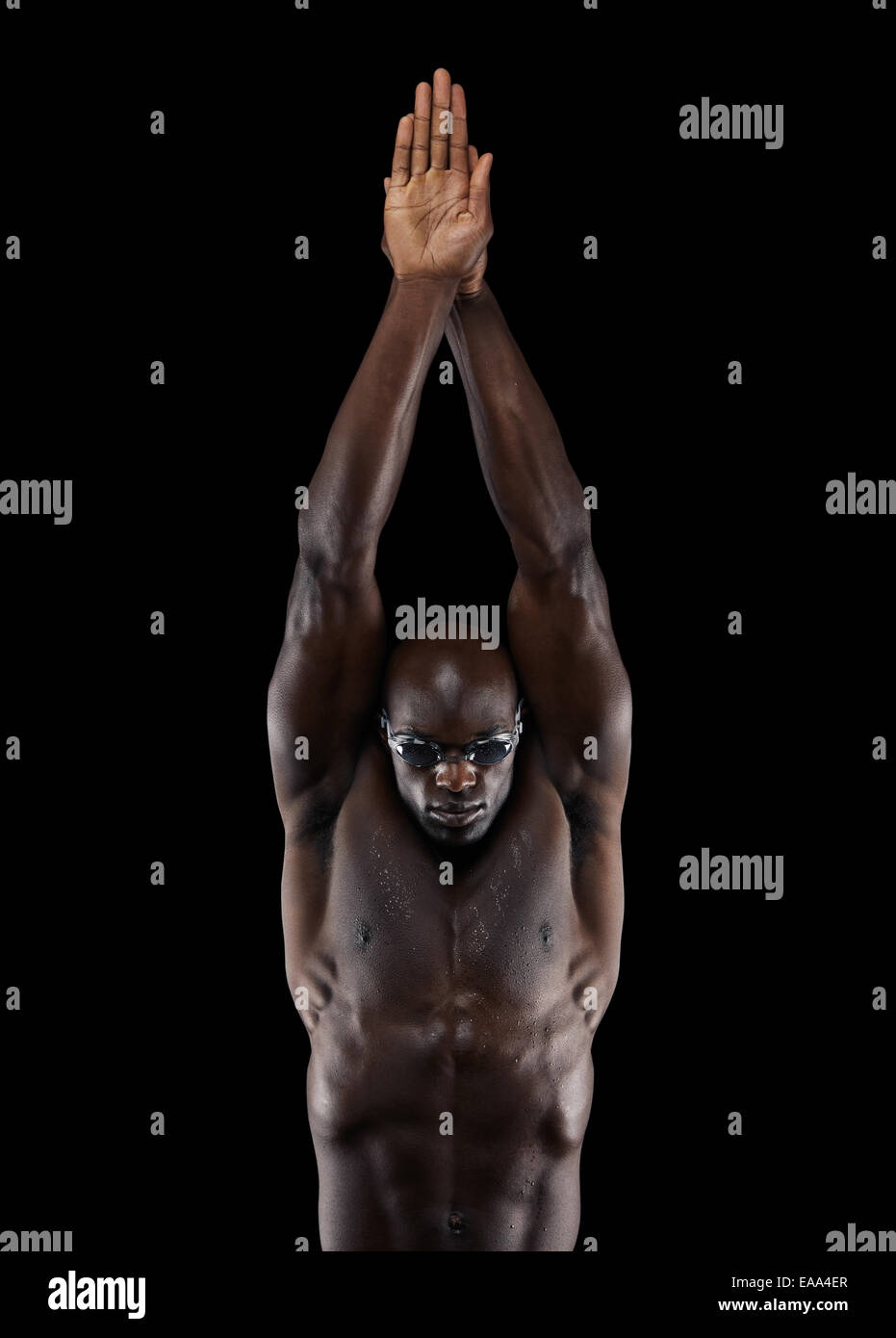 Portrait of professional young swimmer with muscular build about to ...