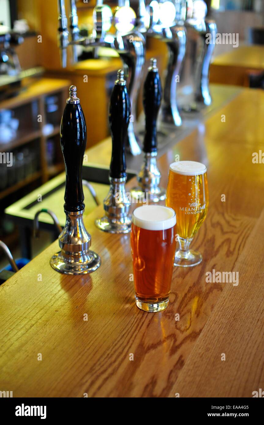 Pints of Meantime Brewery beer on the bar at the Old Brewery pub ...