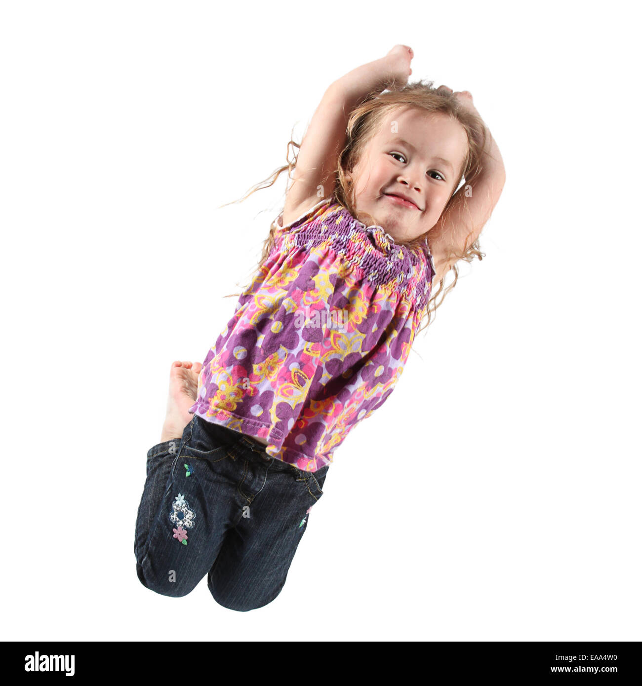 Small girl jumping hi-res stock photography and images - Alamy