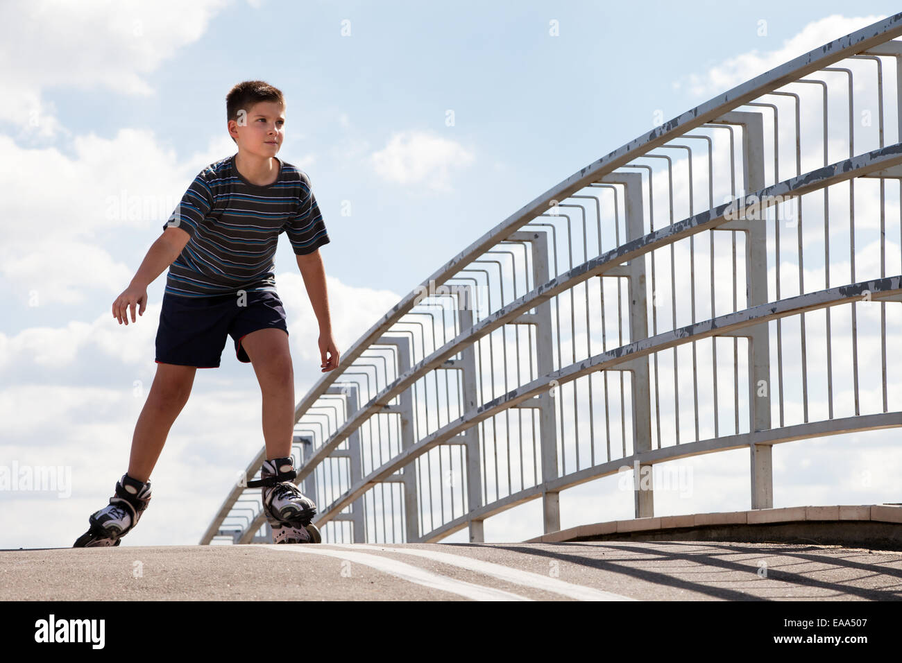 boy roller skating Stock Photo - Alamy