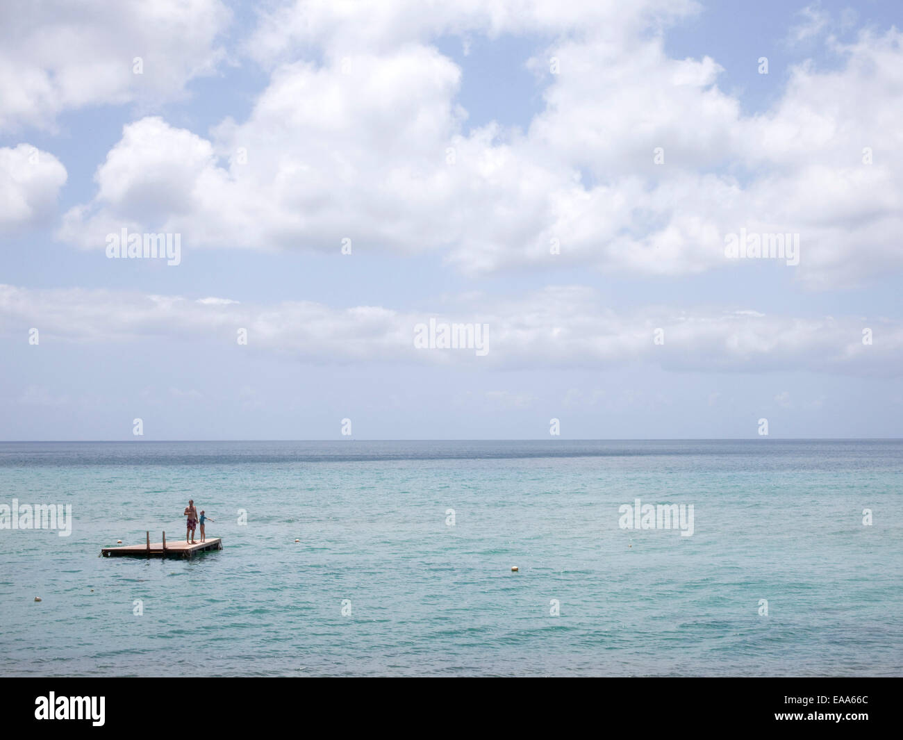 swimmers on raft in Caribbean Sea Stock Photo - Alamy