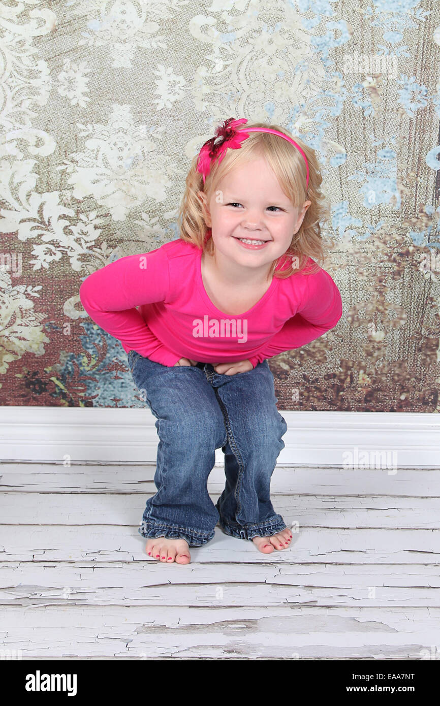 Beautiful Little Girl Posing for Camera in Studio Stock Photo - Alamy