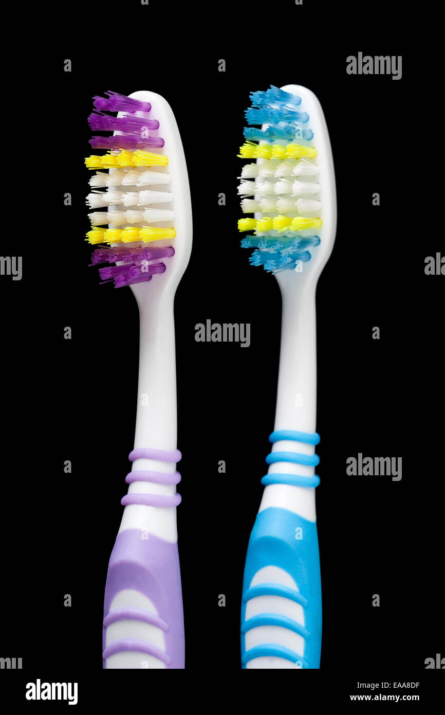Two Toothbrushes isolated on black Stock Photo - Alamy Two Toothbrushes isolated on black Stock Photo - Alamy